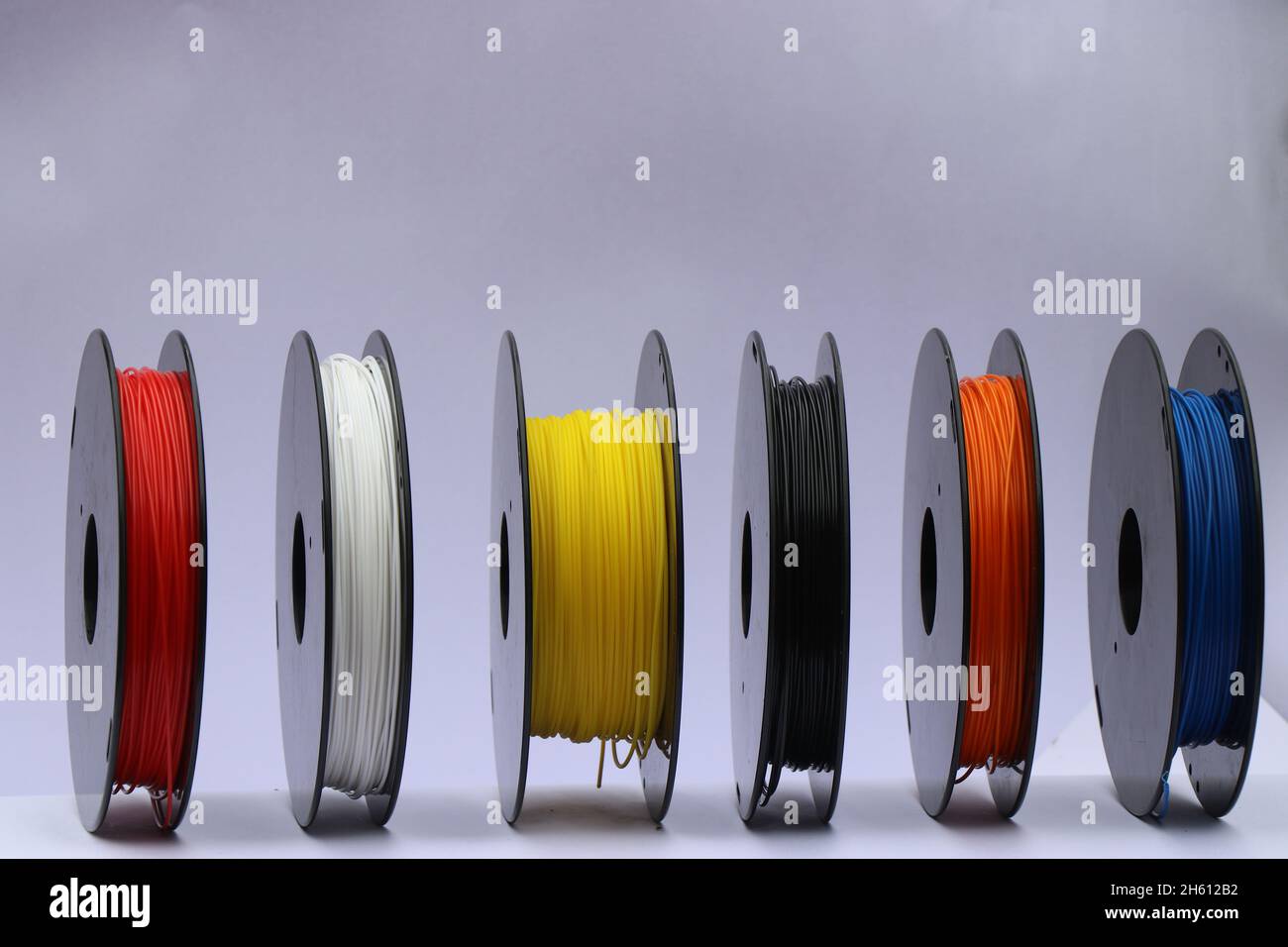 PLA filaments is one of the 3d printing materials, Coils of different ...