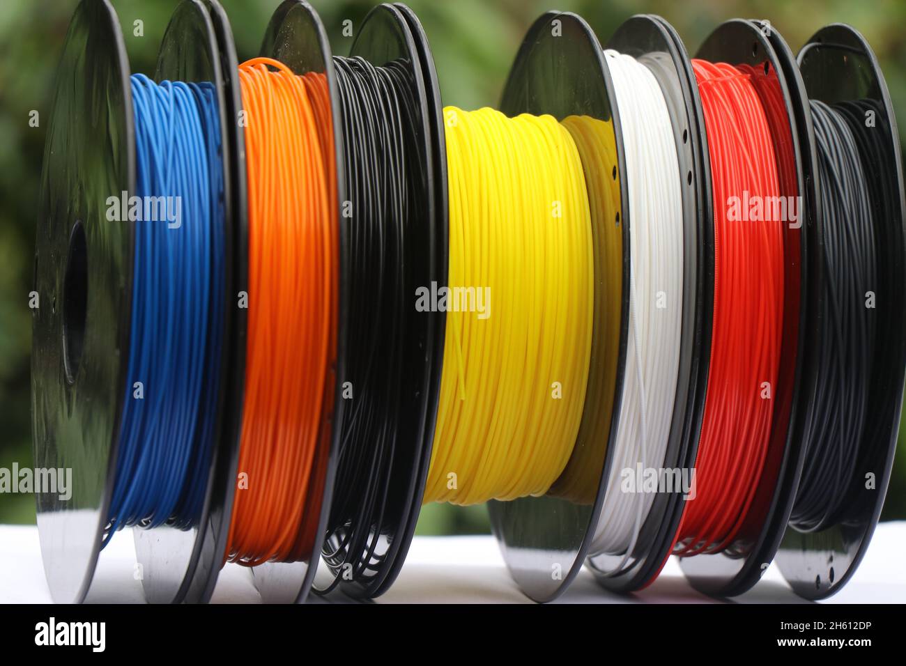 Varieties of color plastic filament in reels for printing on a 3D ...