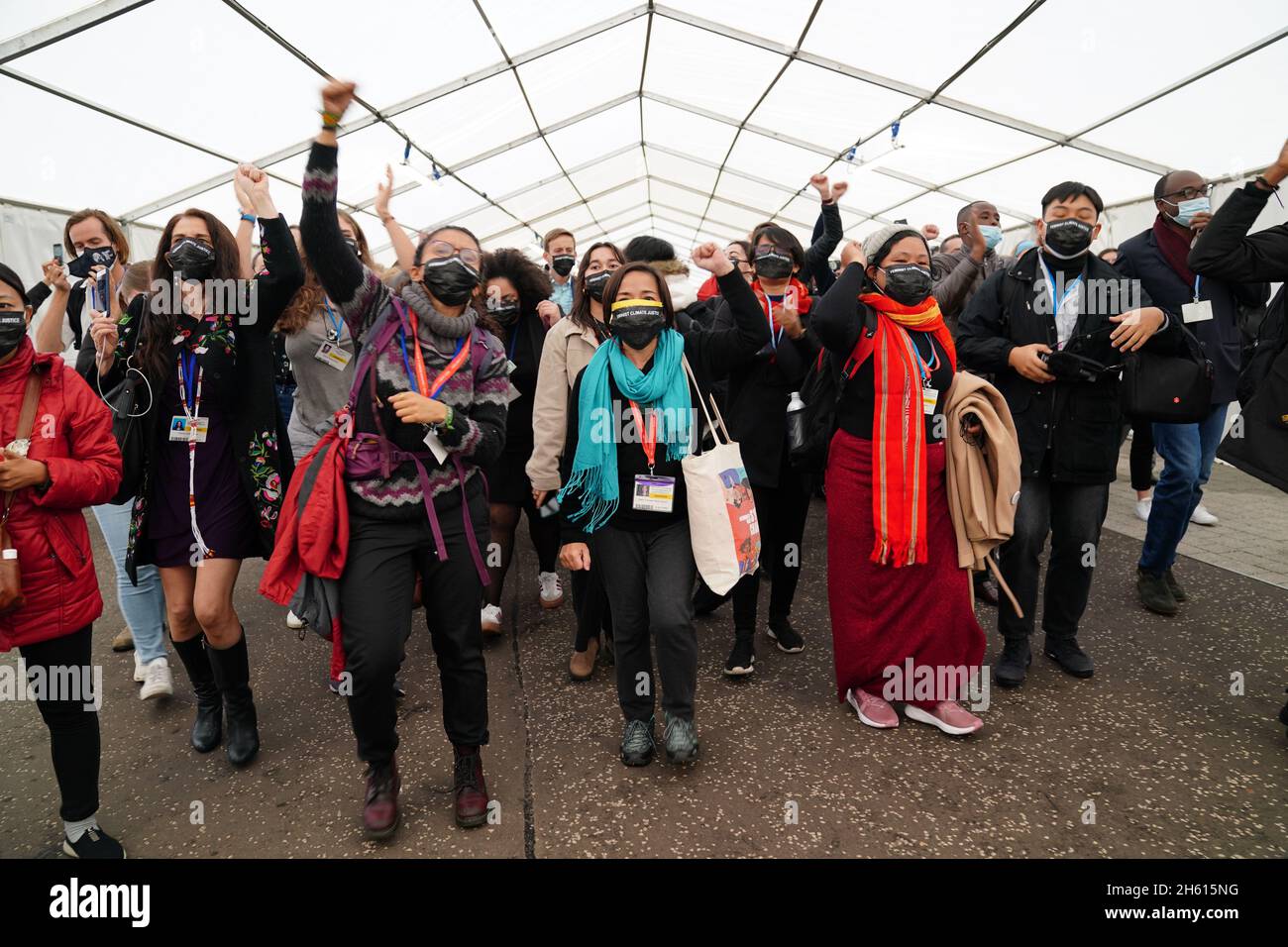 Climate activists hold a demonstration in the venue during the official ...