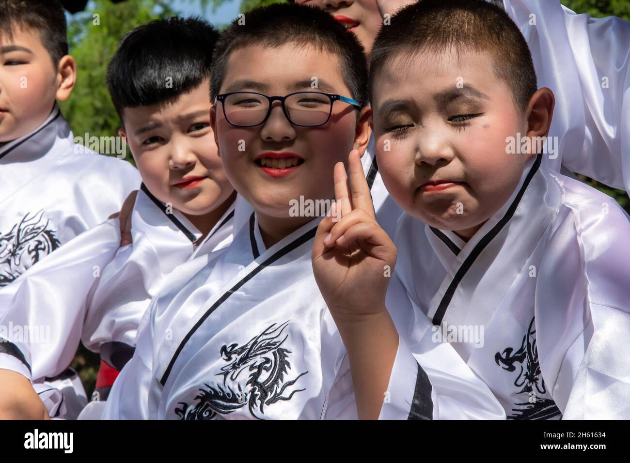 Chinese faces hi-res stock photography and images - Alamy