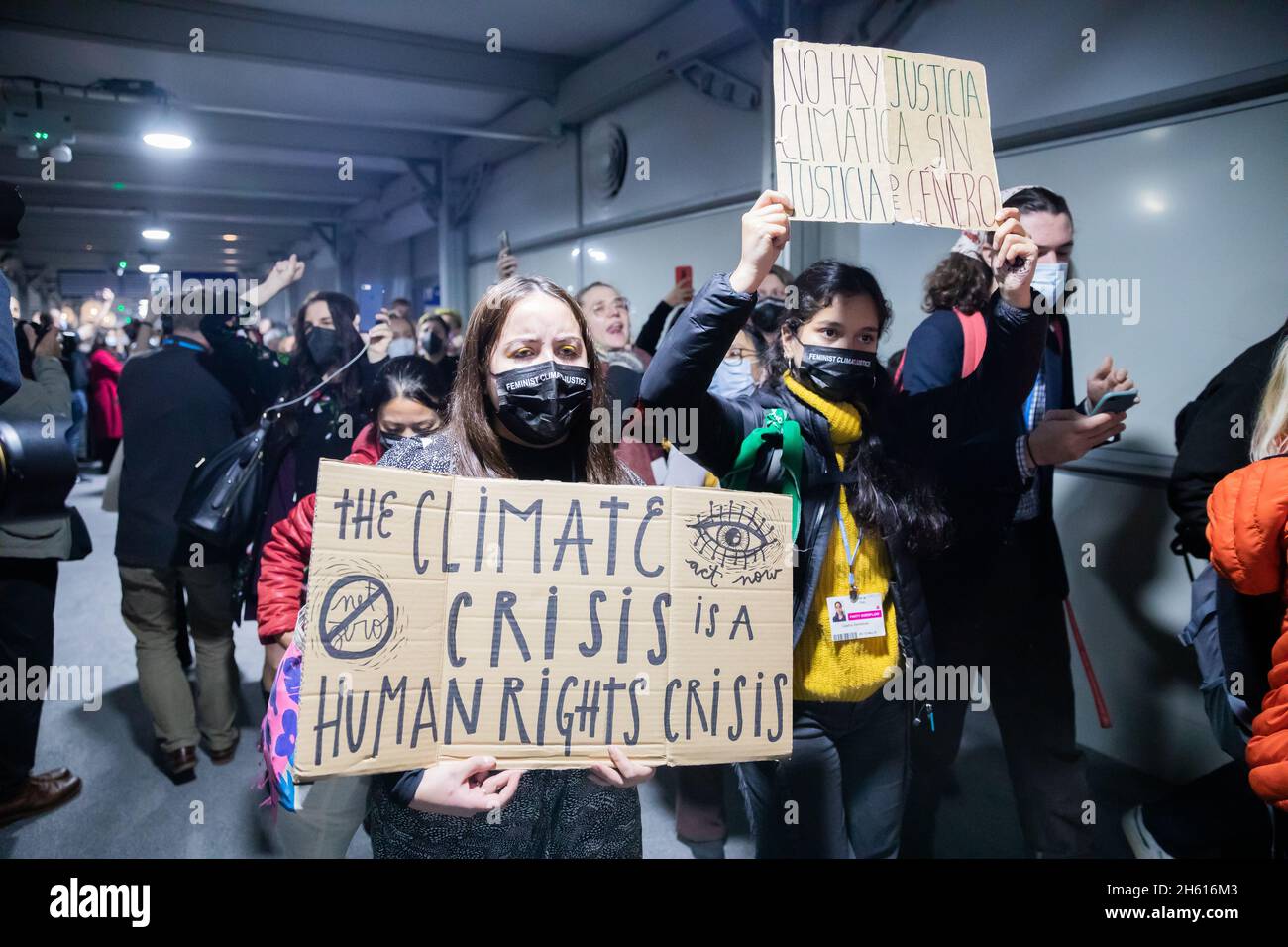 Glasgow, UK. 12th Nov, 2021. People march through a hall at the UN ...