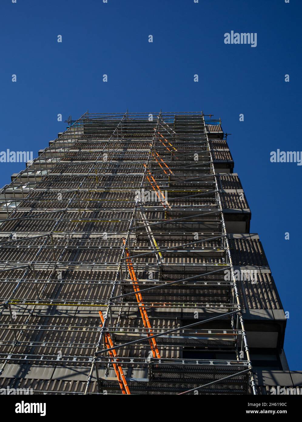 High rise tower housing flats with scaffolding on due to maintenance ...