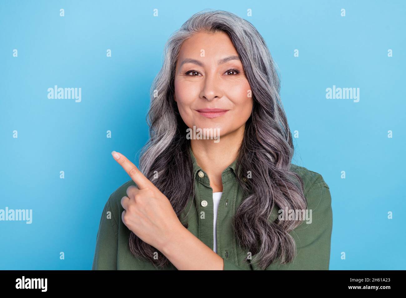 Photo of adorable shiny lady pensioner dressed green shirt smiling ...