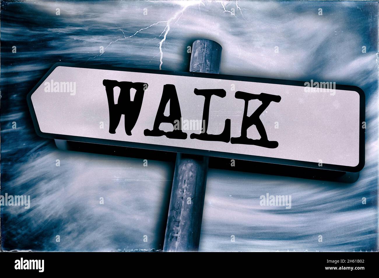 Walk written on a street sign with post, Storm and lightning in the ...