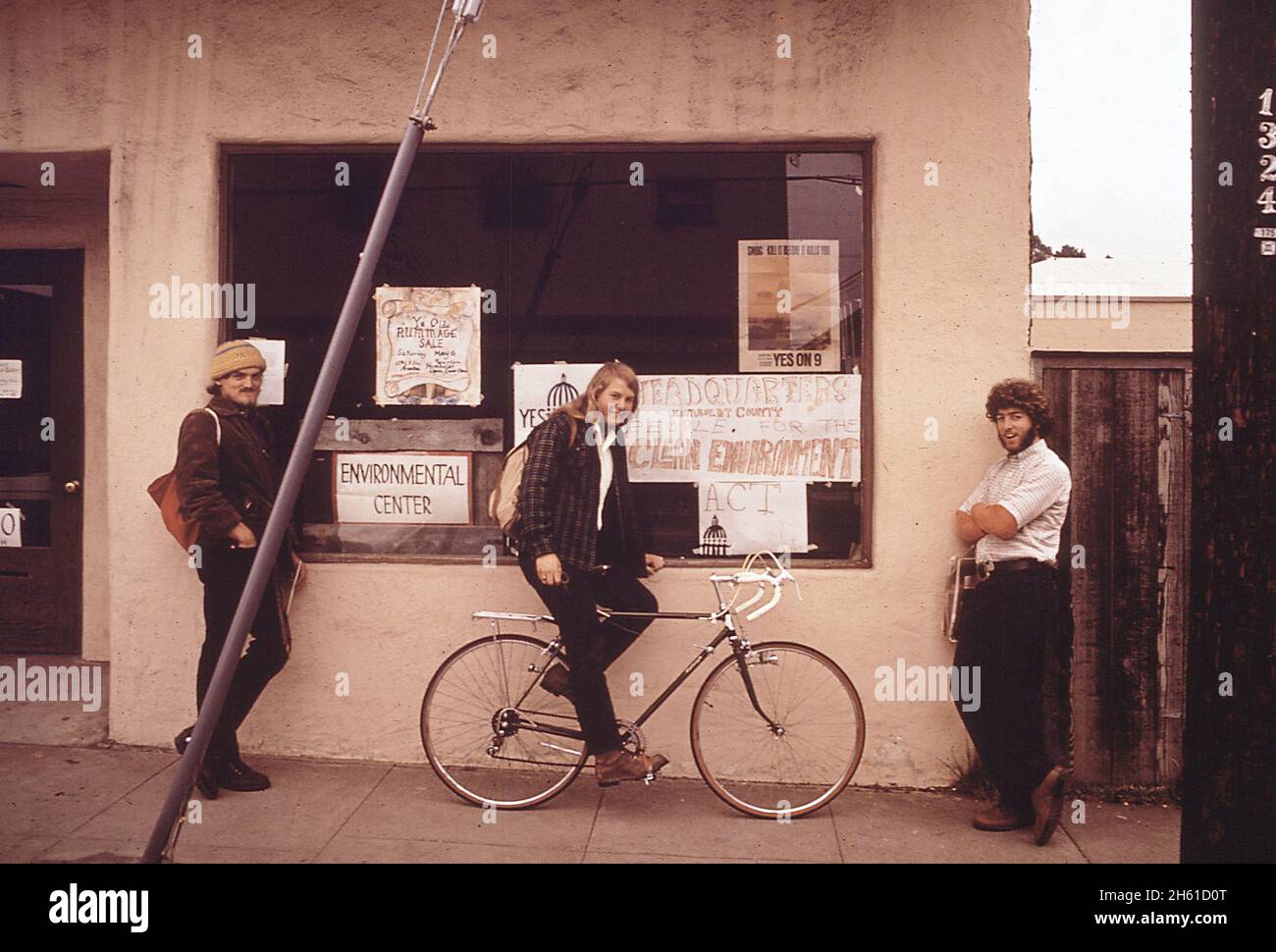 1970s America: A cyclist and two friends outside an environmental ...