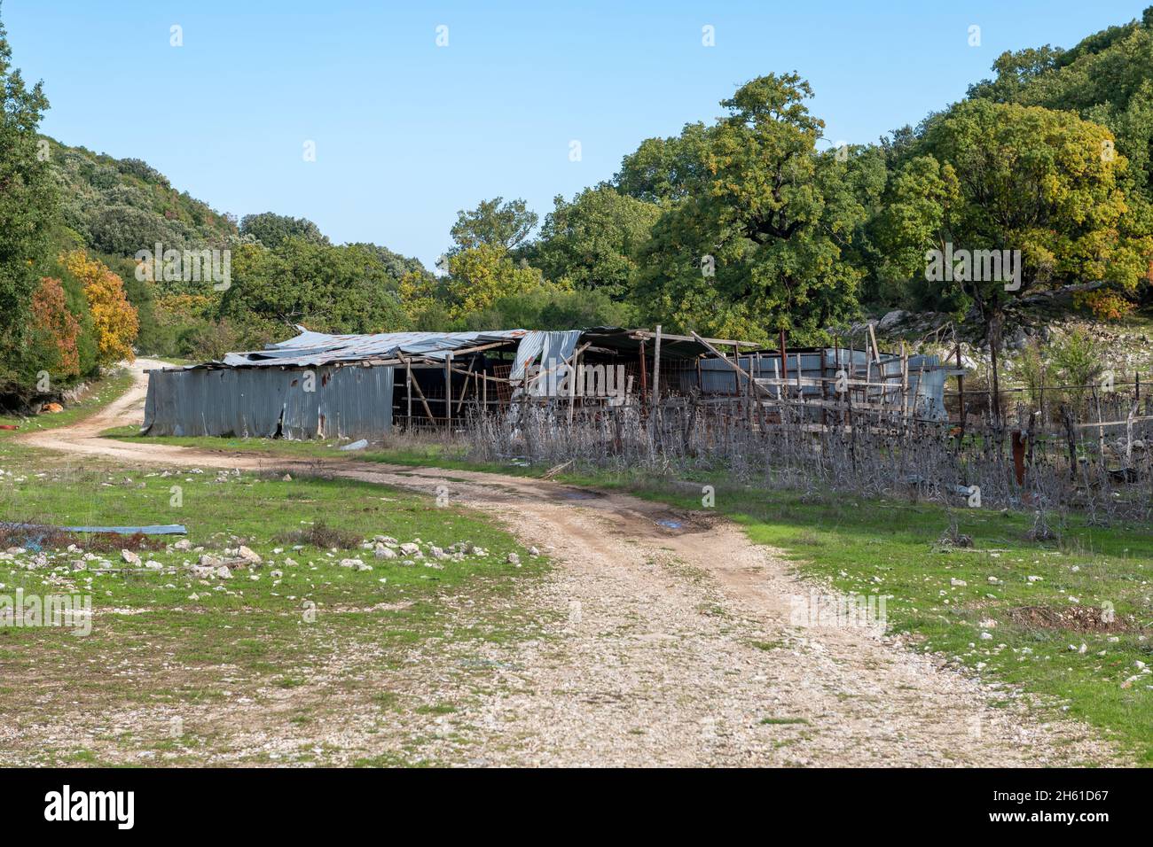 A poor off grid run down farm, home on a mountain side Stock Photo - Alamy
