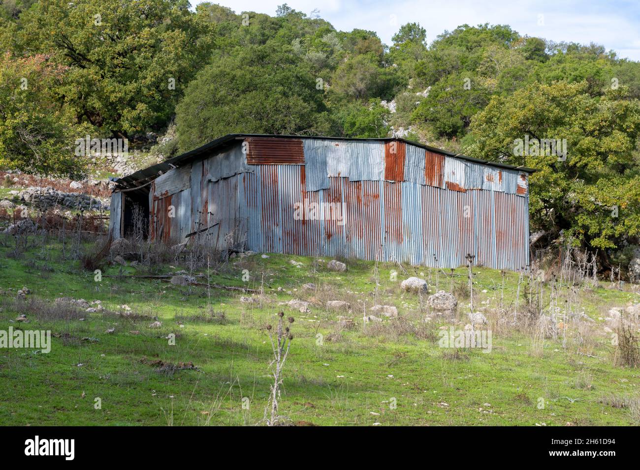 A poor off grid run down farm, home on a mountain side Stock Photo - Alamy