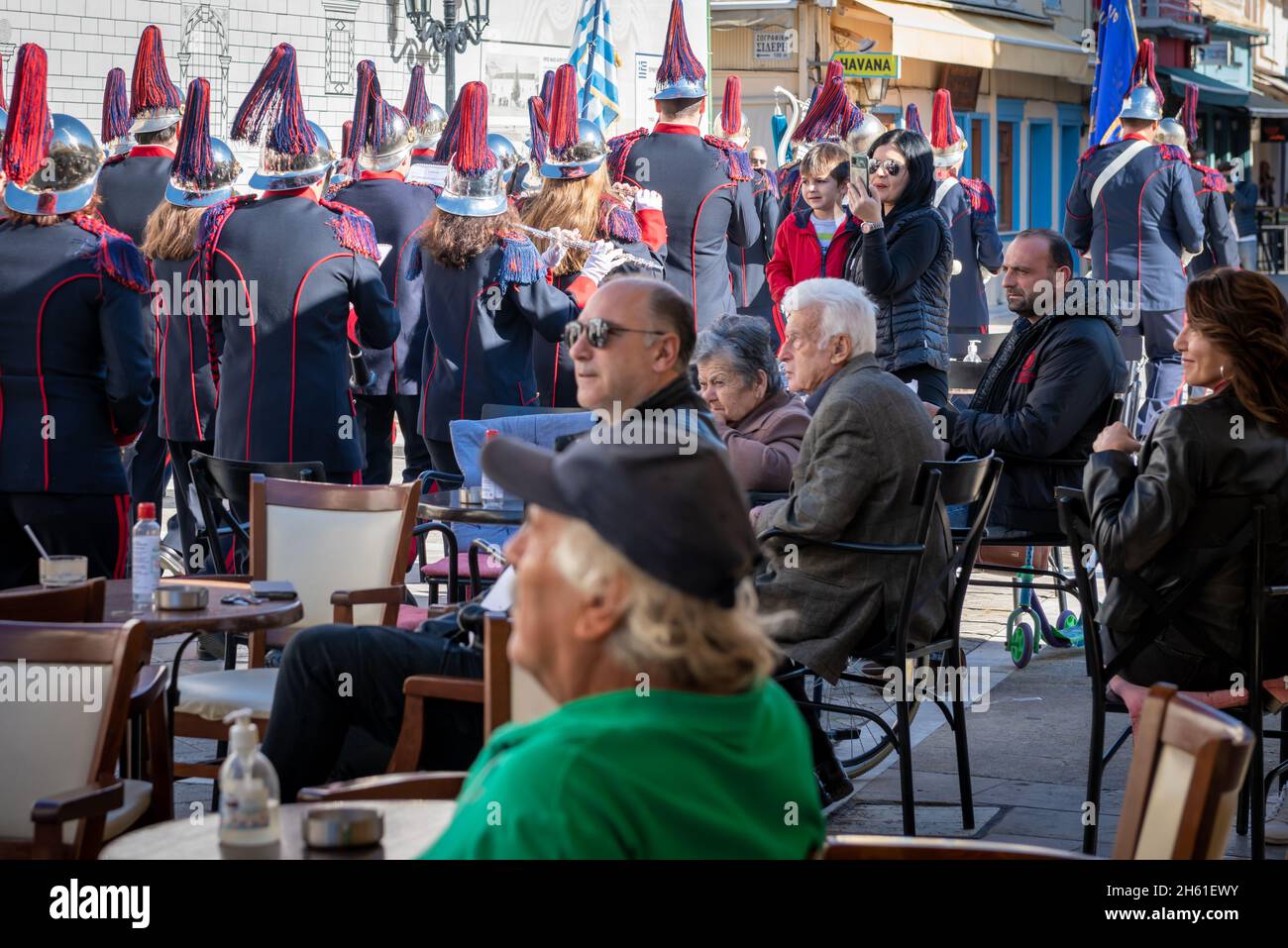 Lefkada. Greece. 10.28.2021. Spectators in a cafe watching military ...