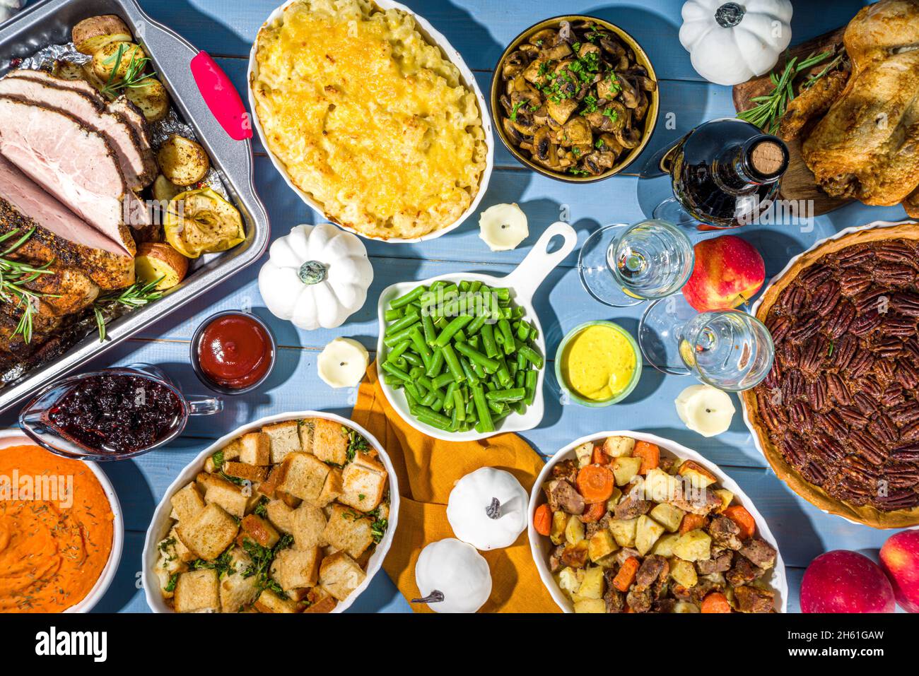Thanksgiving dinner table with new traditional thanksgiving food ...