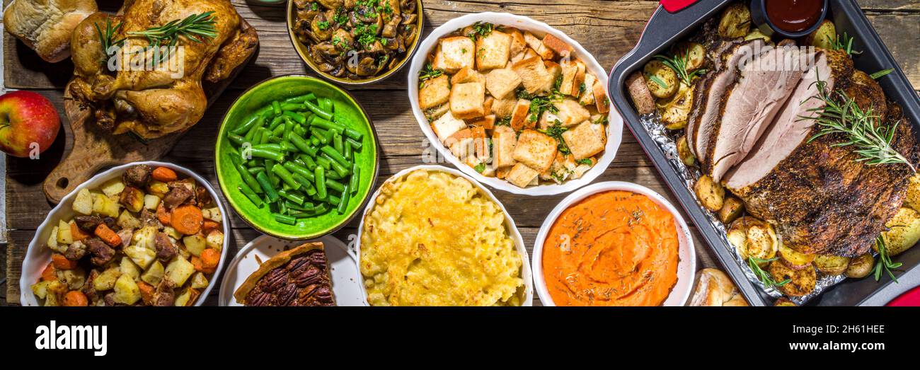 Thanksgiving dinner table with new traditional thanksgiving food ...