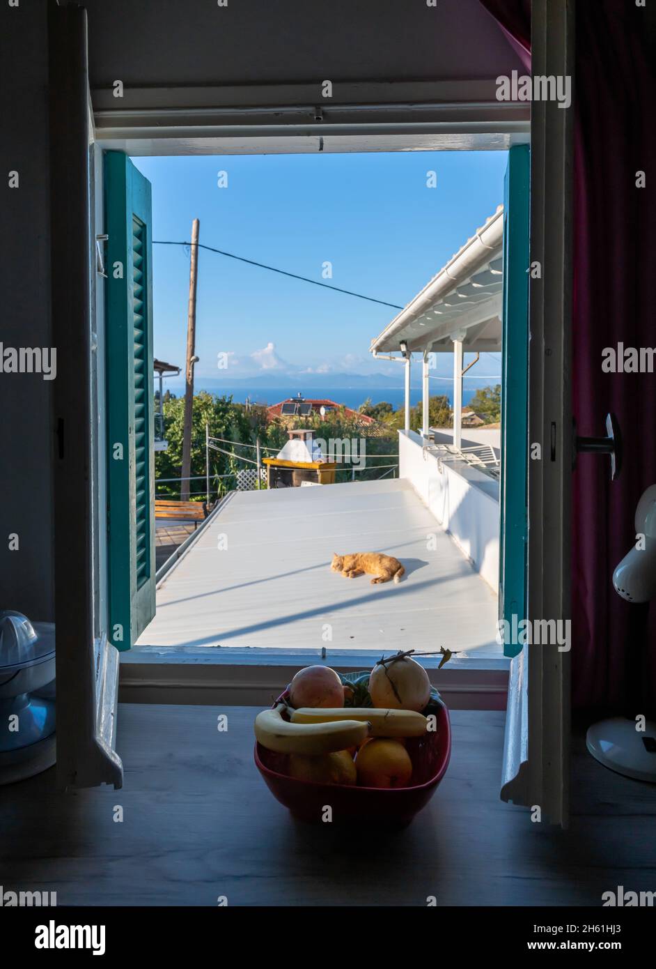 A view through a old wooden window with shutters Stock Photo - Alamy