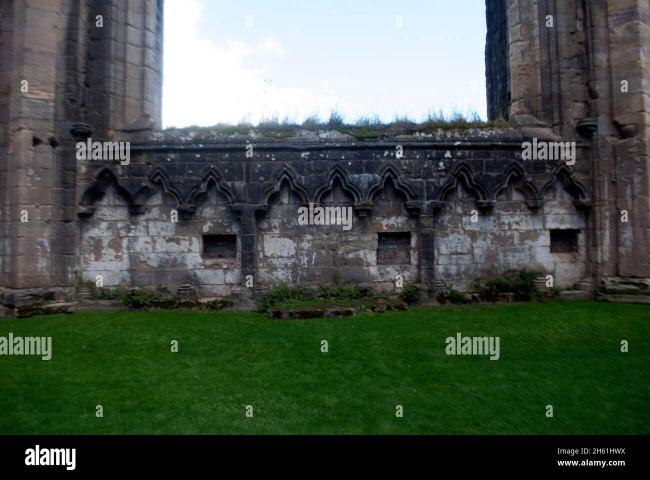 Base of ruined main window at Chapel of Altars, Fountains Abbey ...