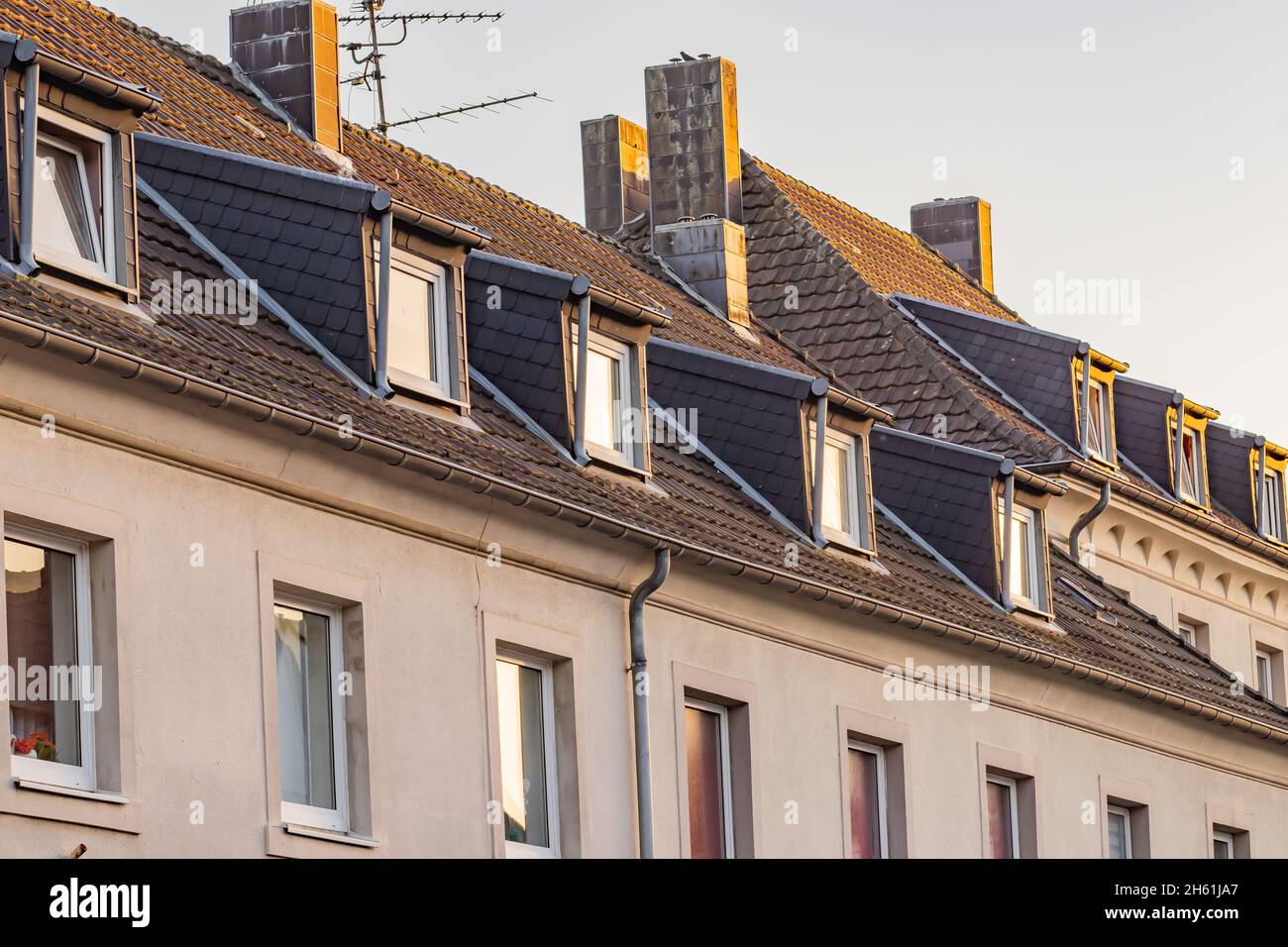Sun rays falling on a residential building Stock Photo - Alamy