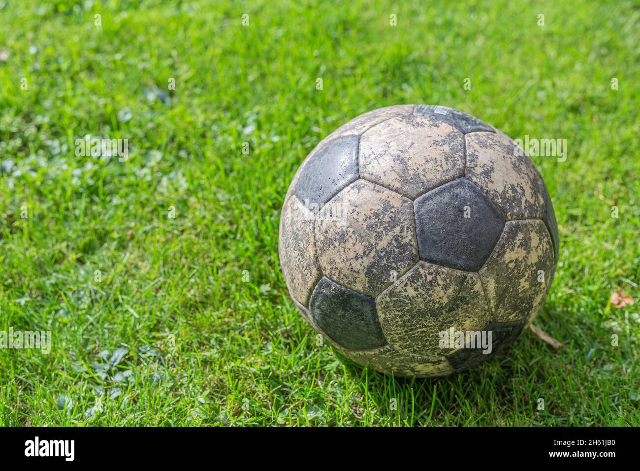 Closeup shot of a dirty football ball outdoors Stock Photo - Alamy
