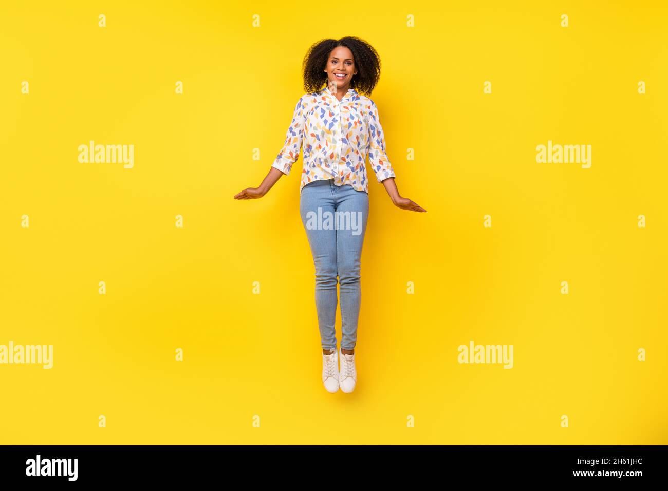 Full length photo of sweet young wavy hairdo lady jump wear blouse ...