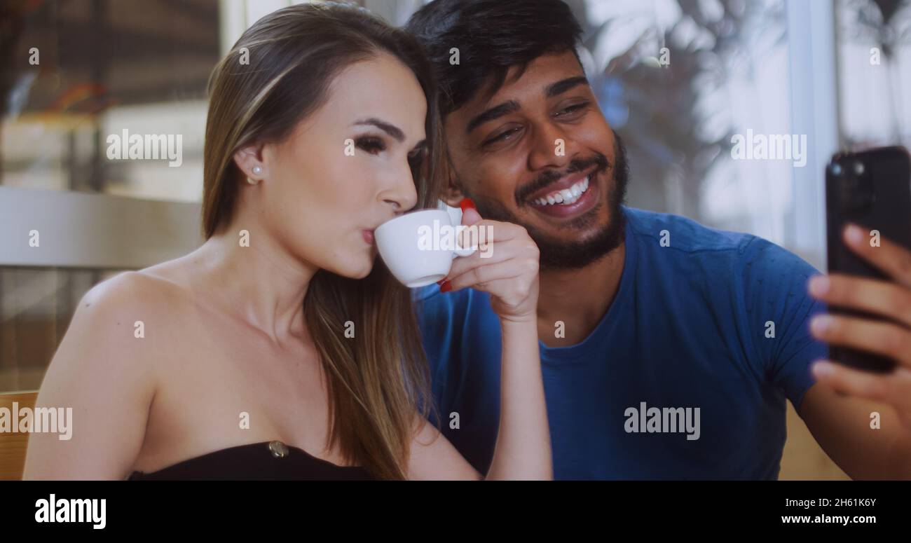 Latino couple talking home hi-res stock photography and images - Alamy