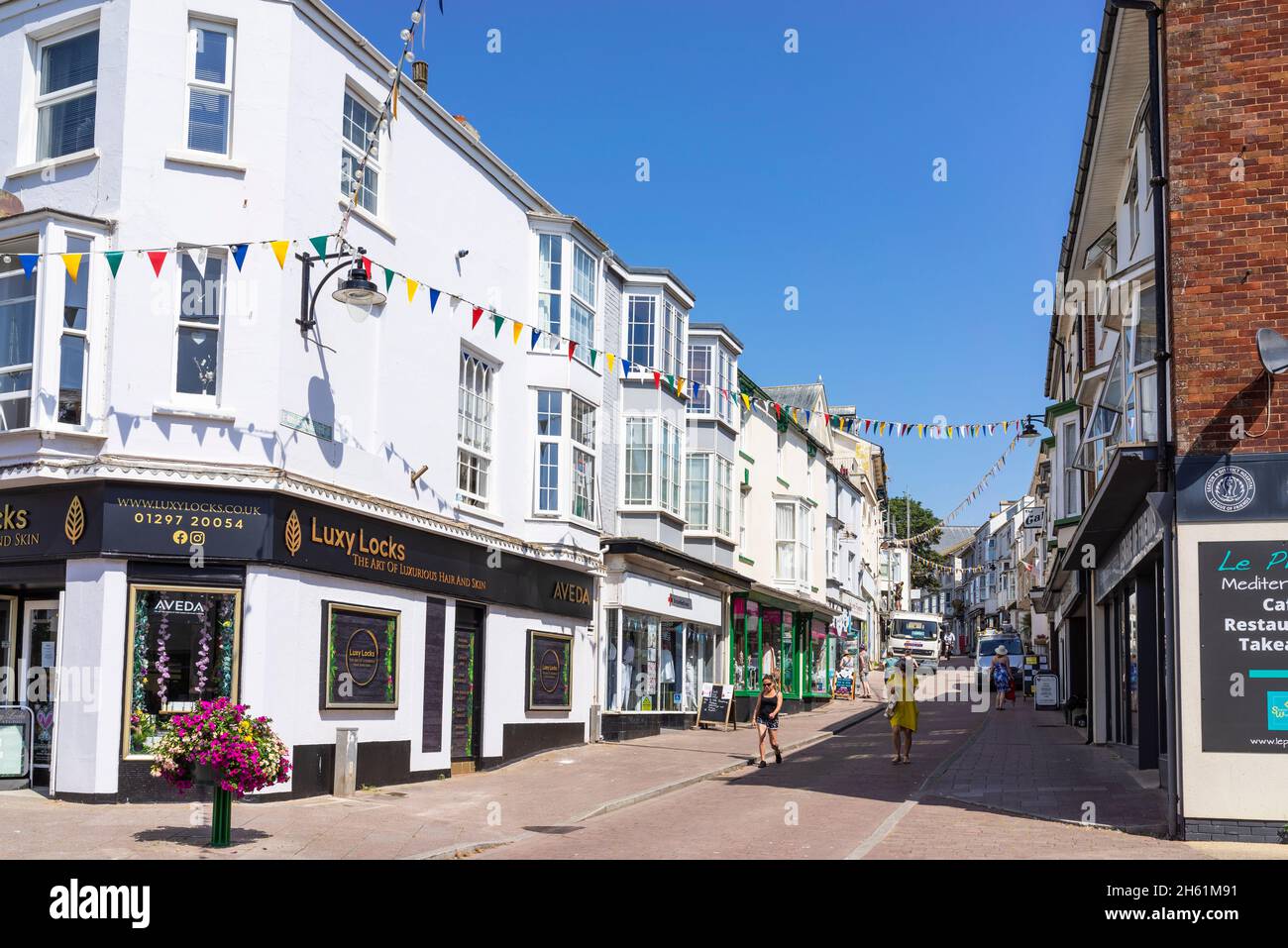 Shops hairdressers and other businesses on Fore street Seaton Devon ...
