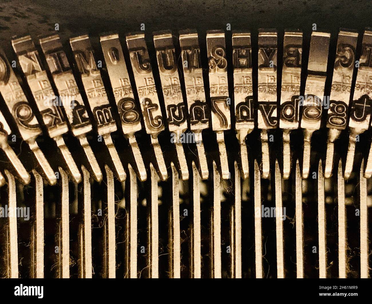 Detail of strike bars on an old typewriter Stock Photo - Alamy