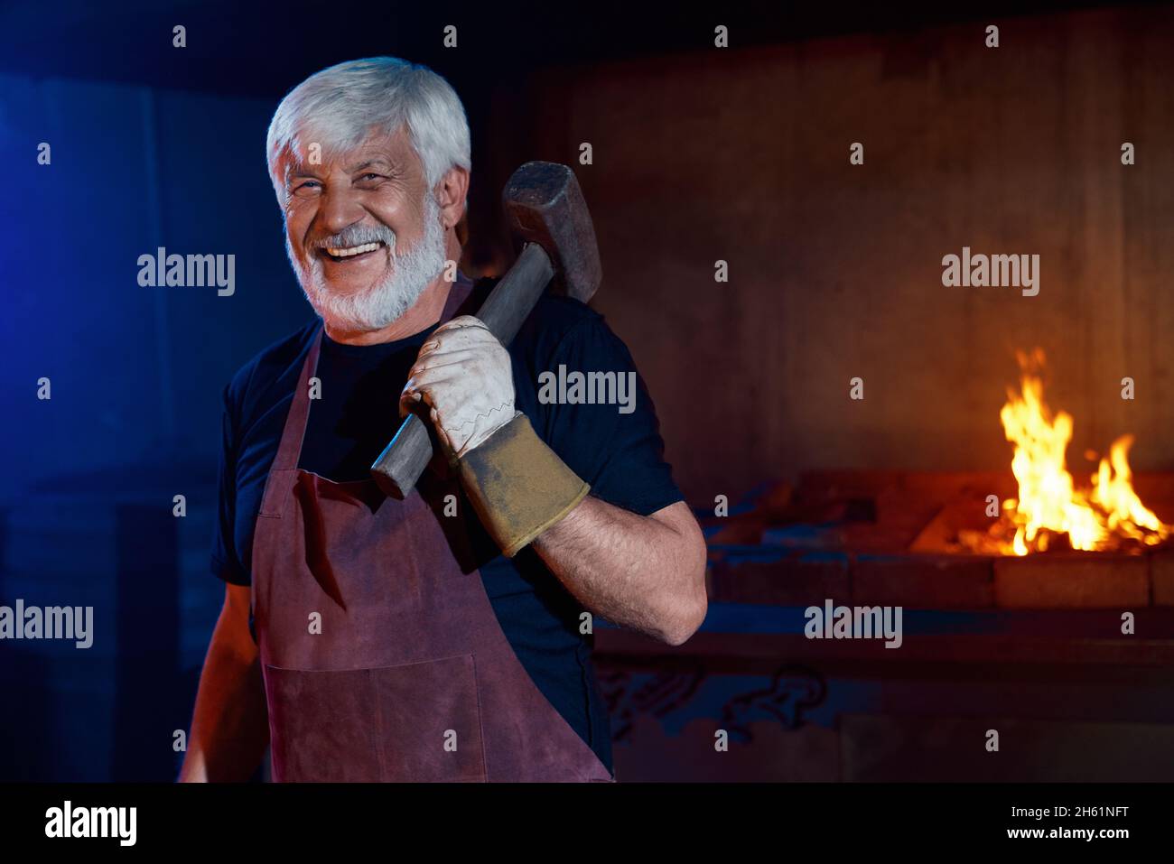 Man Holding Hammer On His Shoulder High Resolution Stock Photography ...