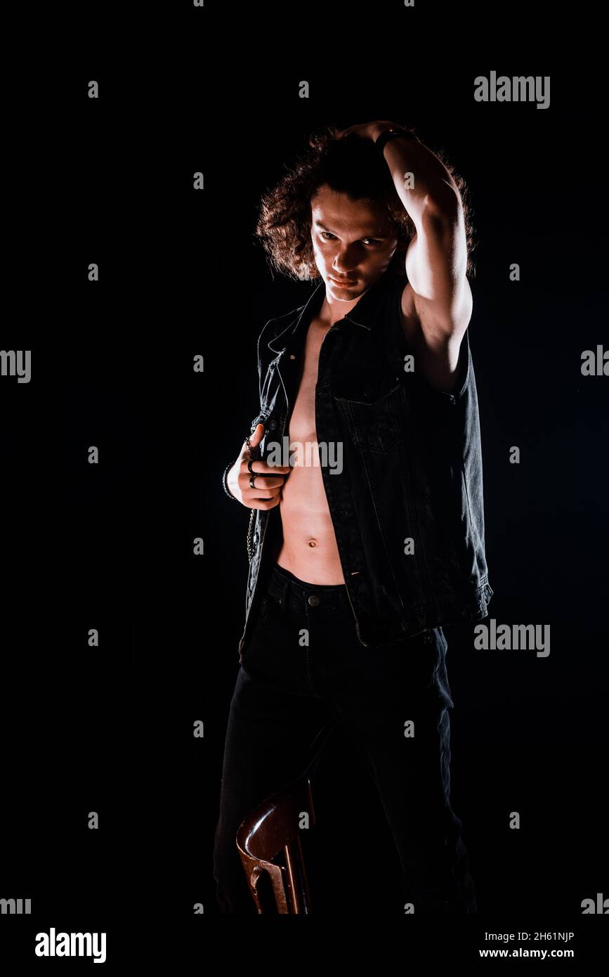 Portrait of a handsome male model posing in cool fashionable clothing ...