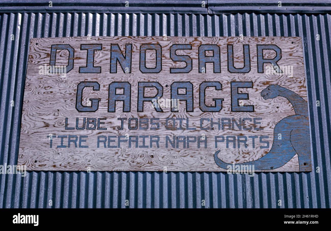 Dinosaur garage sign hi-res stock photography and images - Alamy