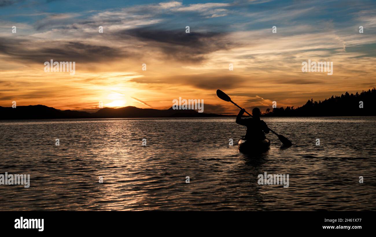 canoeist off salt spring island Stock Photo - Alamy