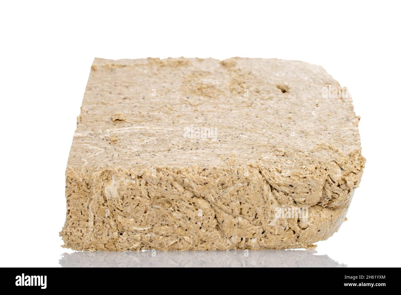 One slice of vanilla halva, close-up, isolated on white Stock Photo - Alamy