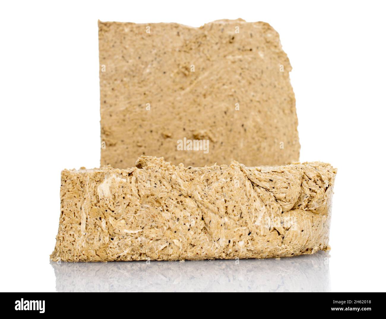 Two slices of vanilla halva, close-up, isolated on white Stock Photo ...