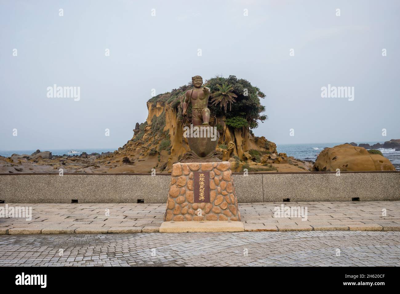 Fisherman statue in heping island park with cliff hi-res stock ...