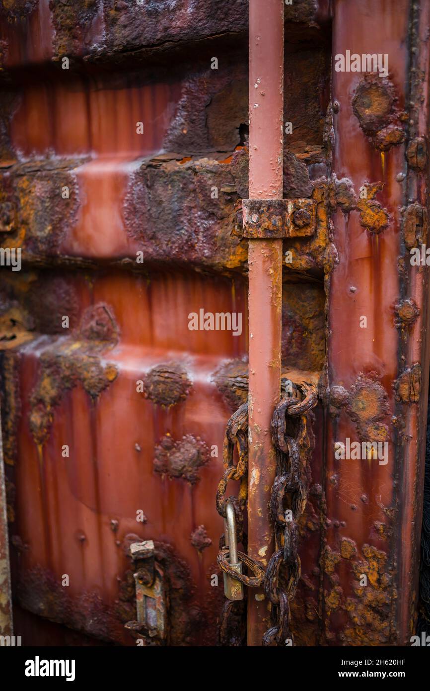 rusty container in the port of heping Stock Photo - Alamy