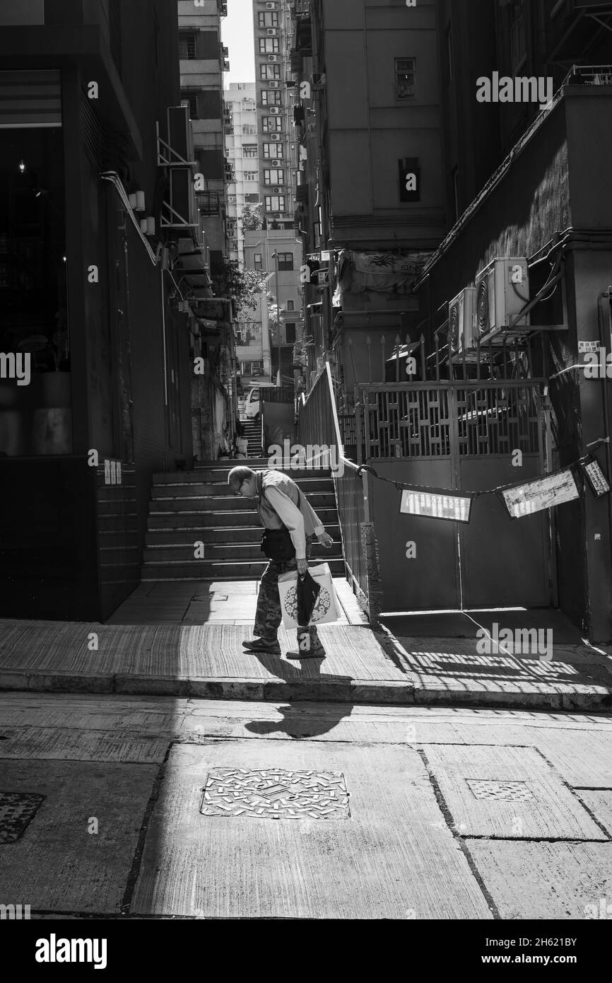 Stooped posture Black and White Stock Photos & Images - Alamy