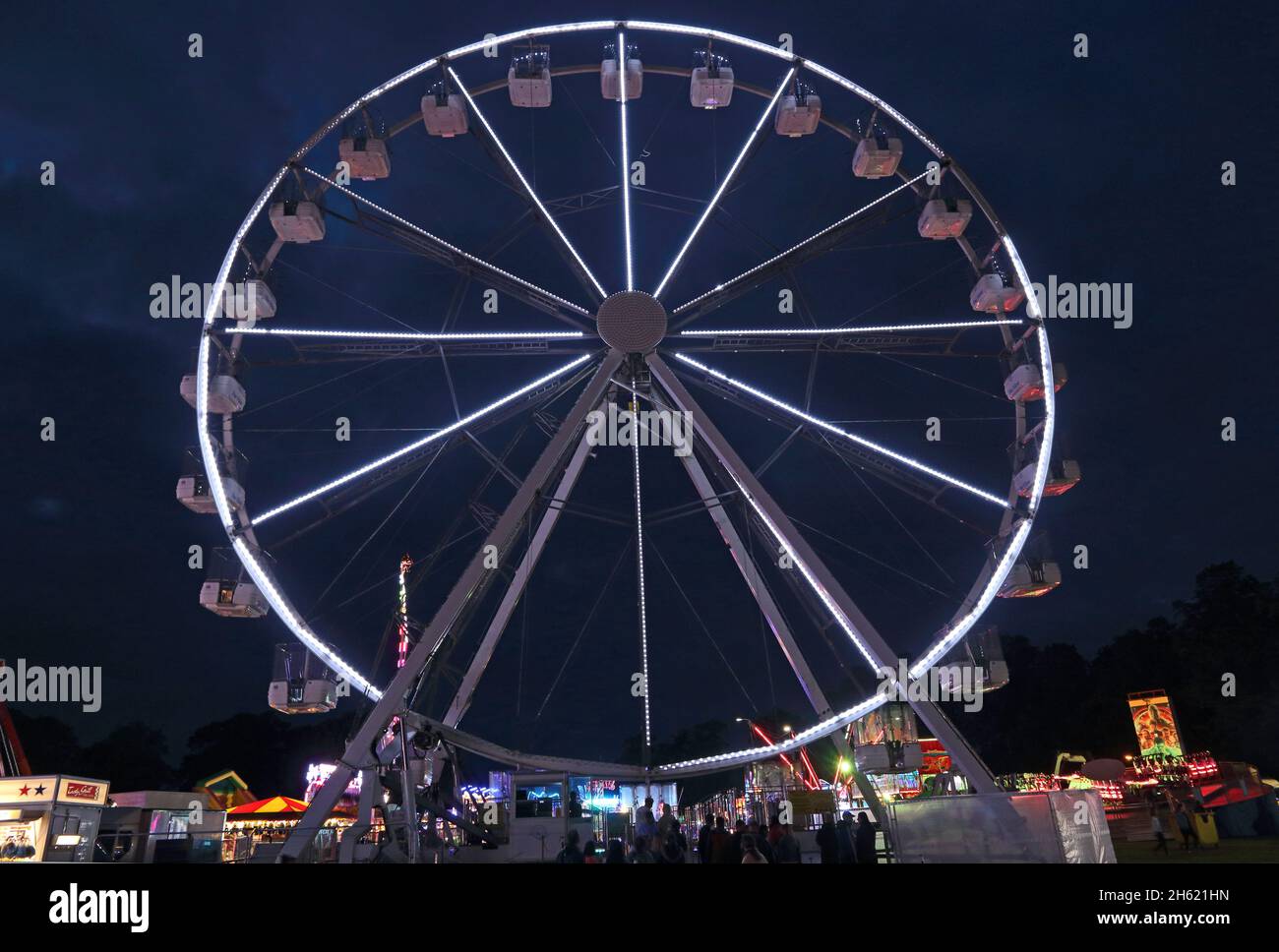 Fairground Big Wheel, after dark at York Balloon Fiesta 2021 Stock ...