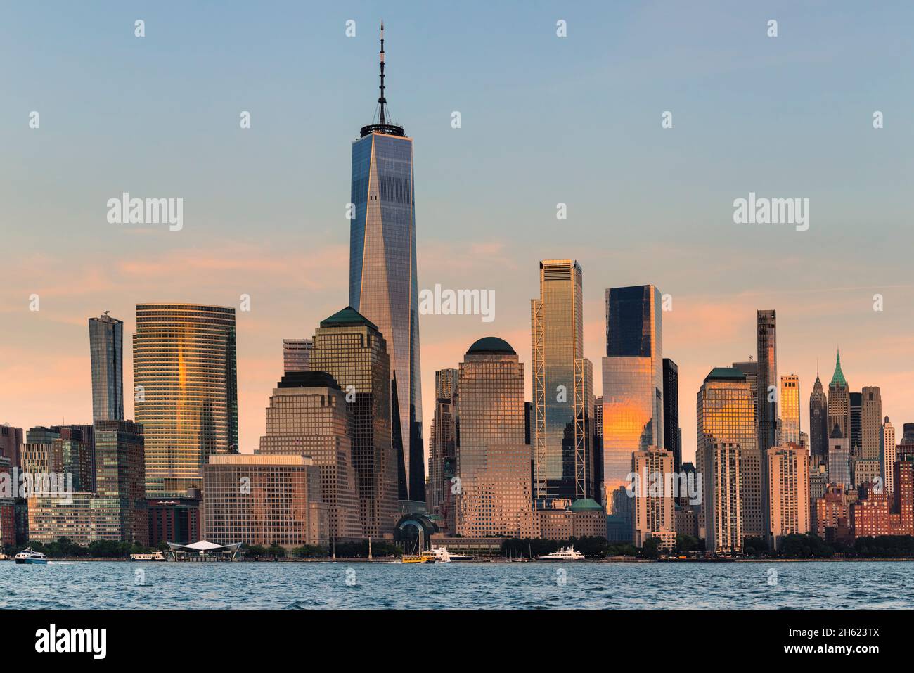 manhattan skyline with one world trade center at sunset,new york city ...