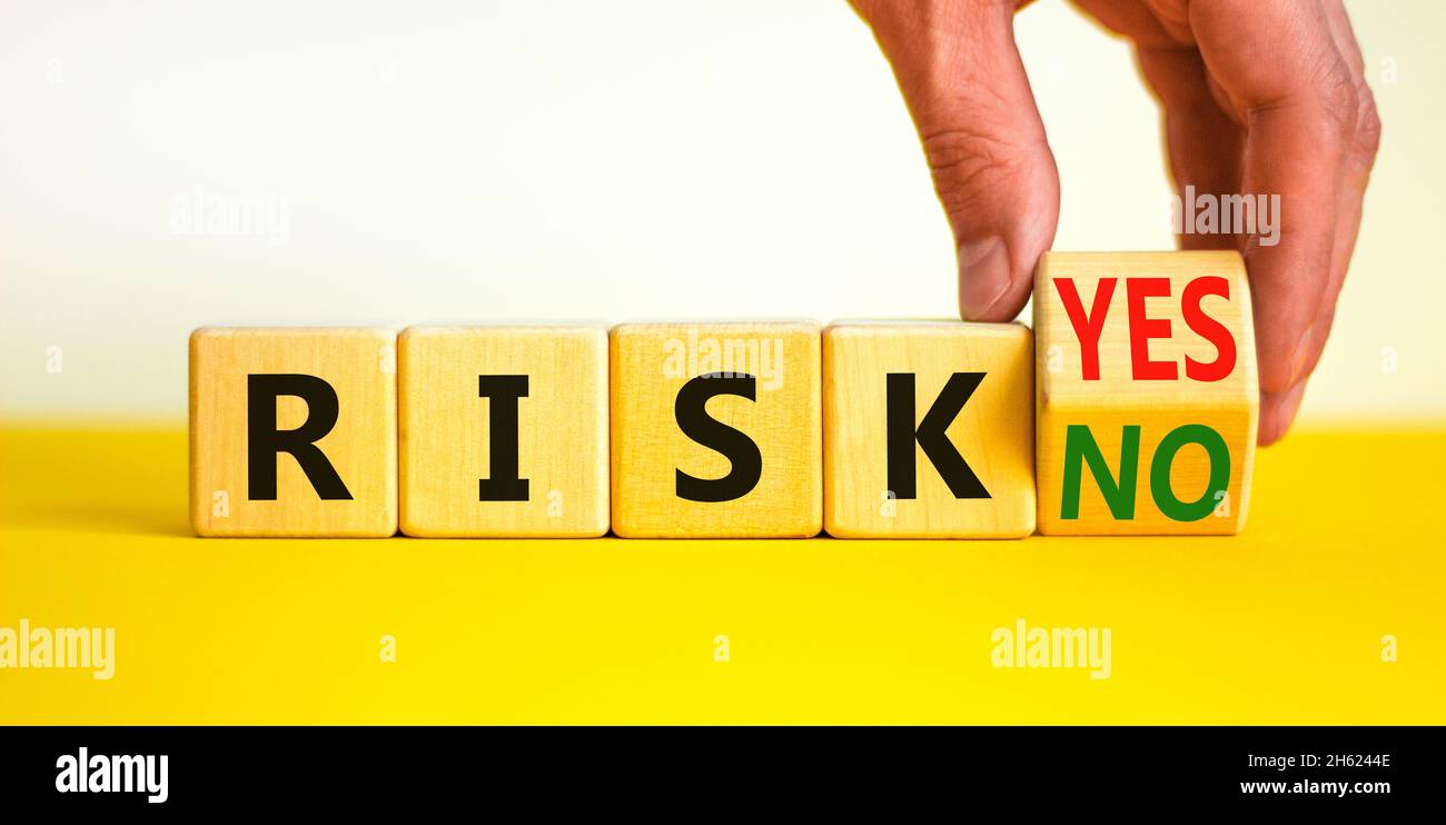 Question about Risk symbol. Businessman turns a wooden cube and changes ...