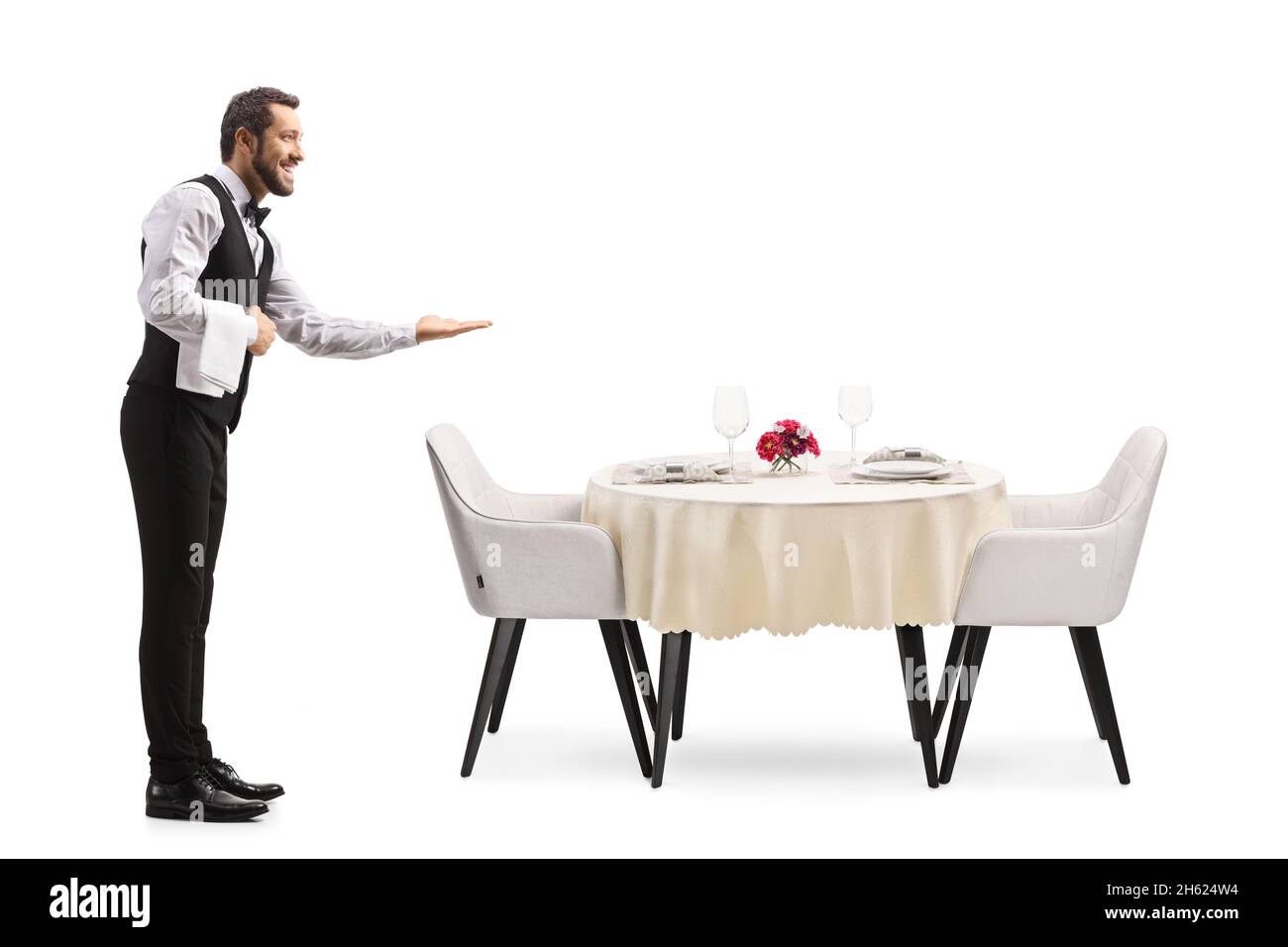 Full length profile shot of an elegant waiter welcoming next to a ...