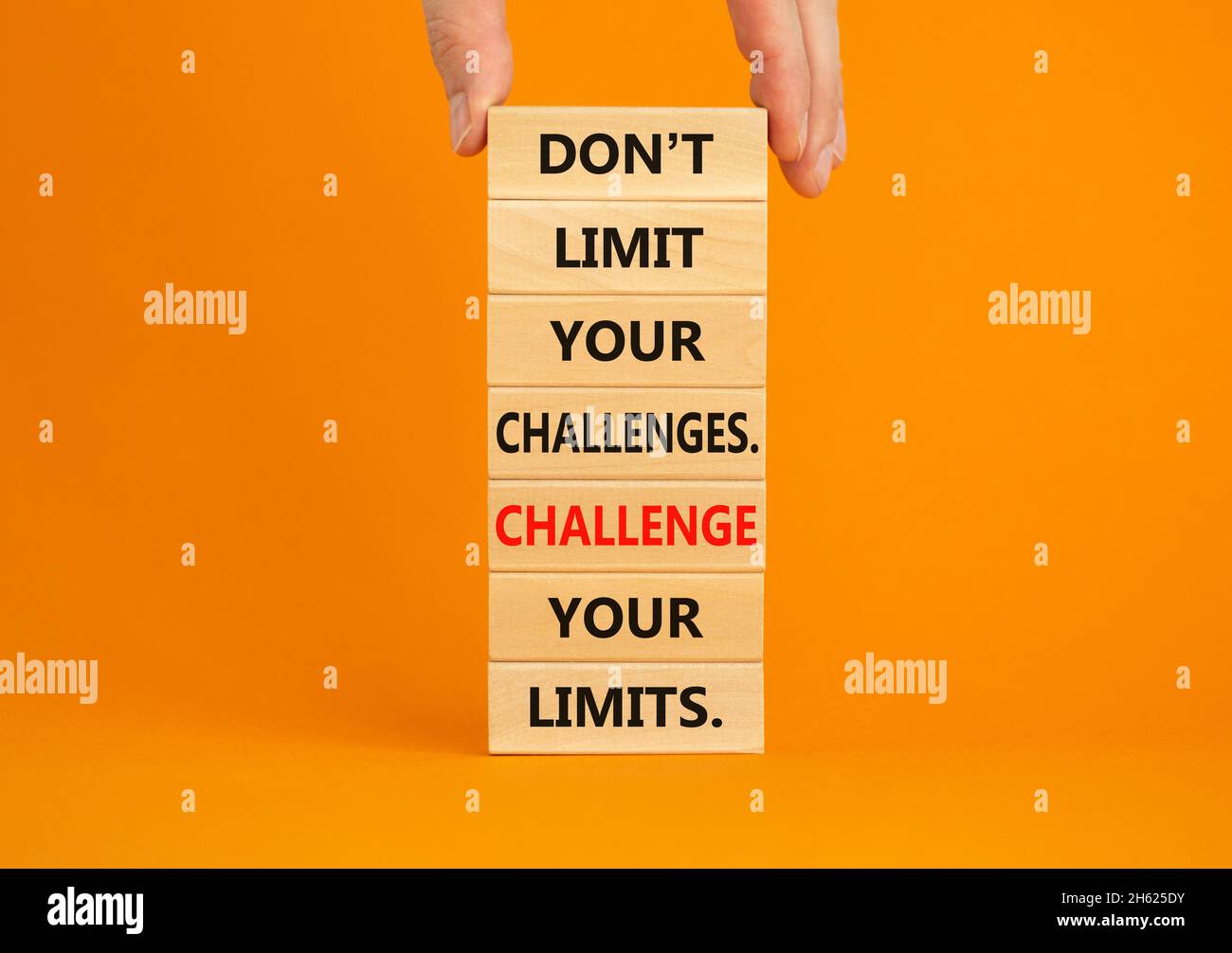 Do not limit your challenges symbol. Wooden blocks with words Do not ...
