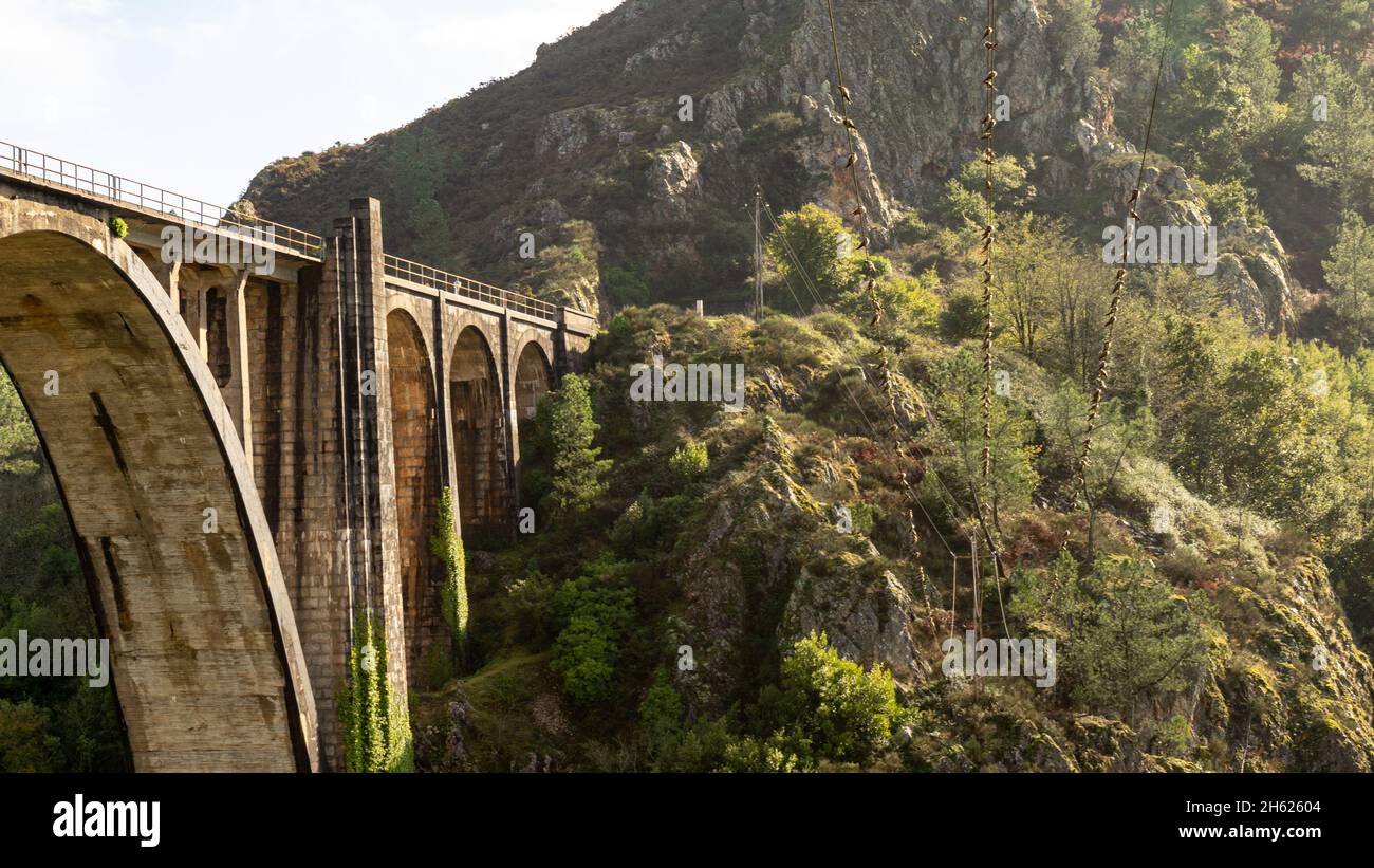 railway viaduct built over a span to save the valley from a river Stock ...