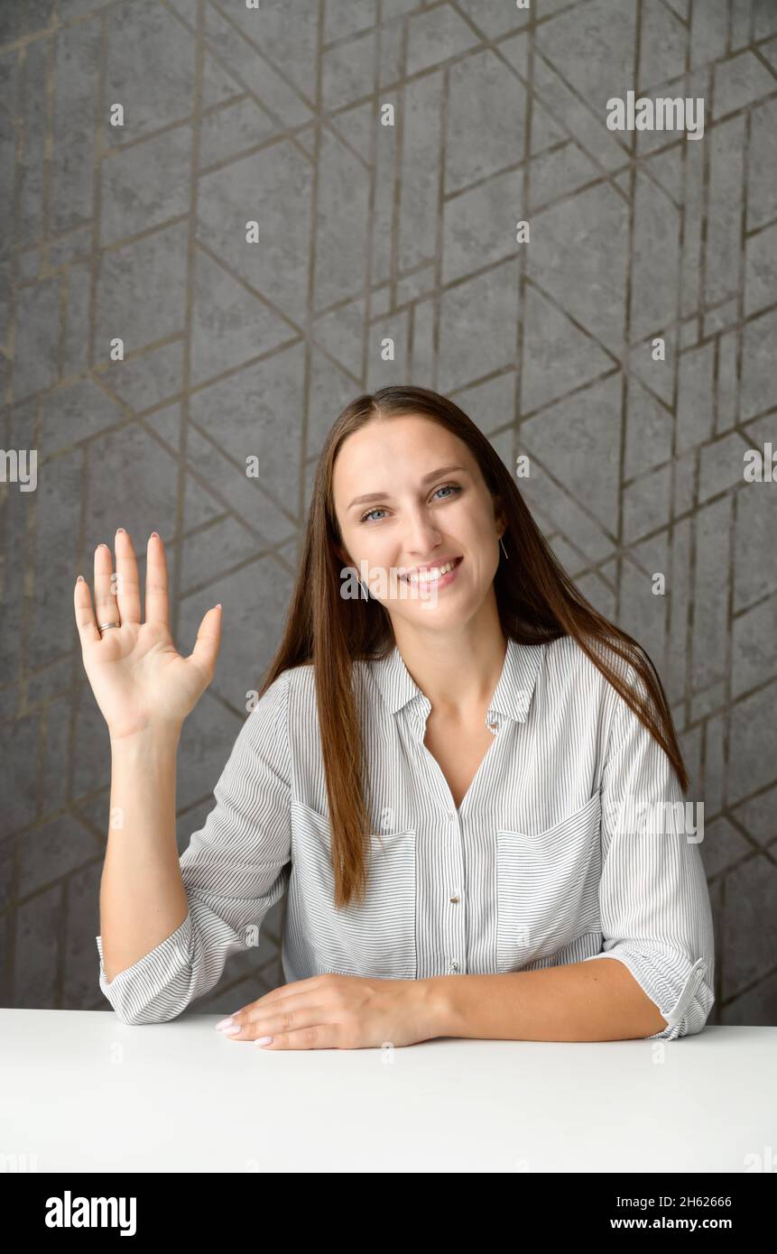 Virtual portrait of smiling female employee during video meeting ...