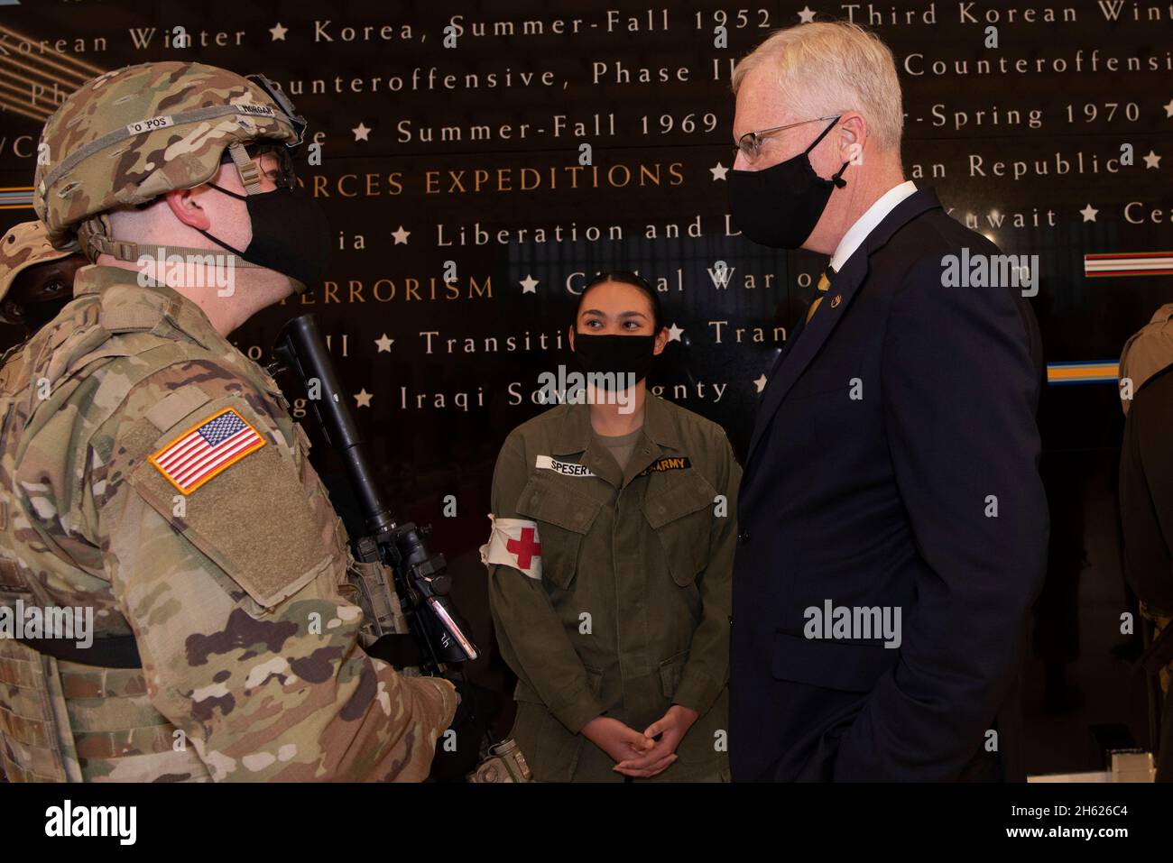 Reportage: Acting Defense Secretary Christopher C. Miller greets a ...