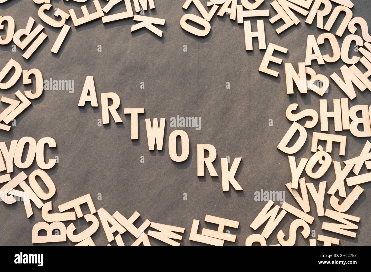Artwork Word In Wooden Cube Alphabet Letters Top View On A rustic paper ...