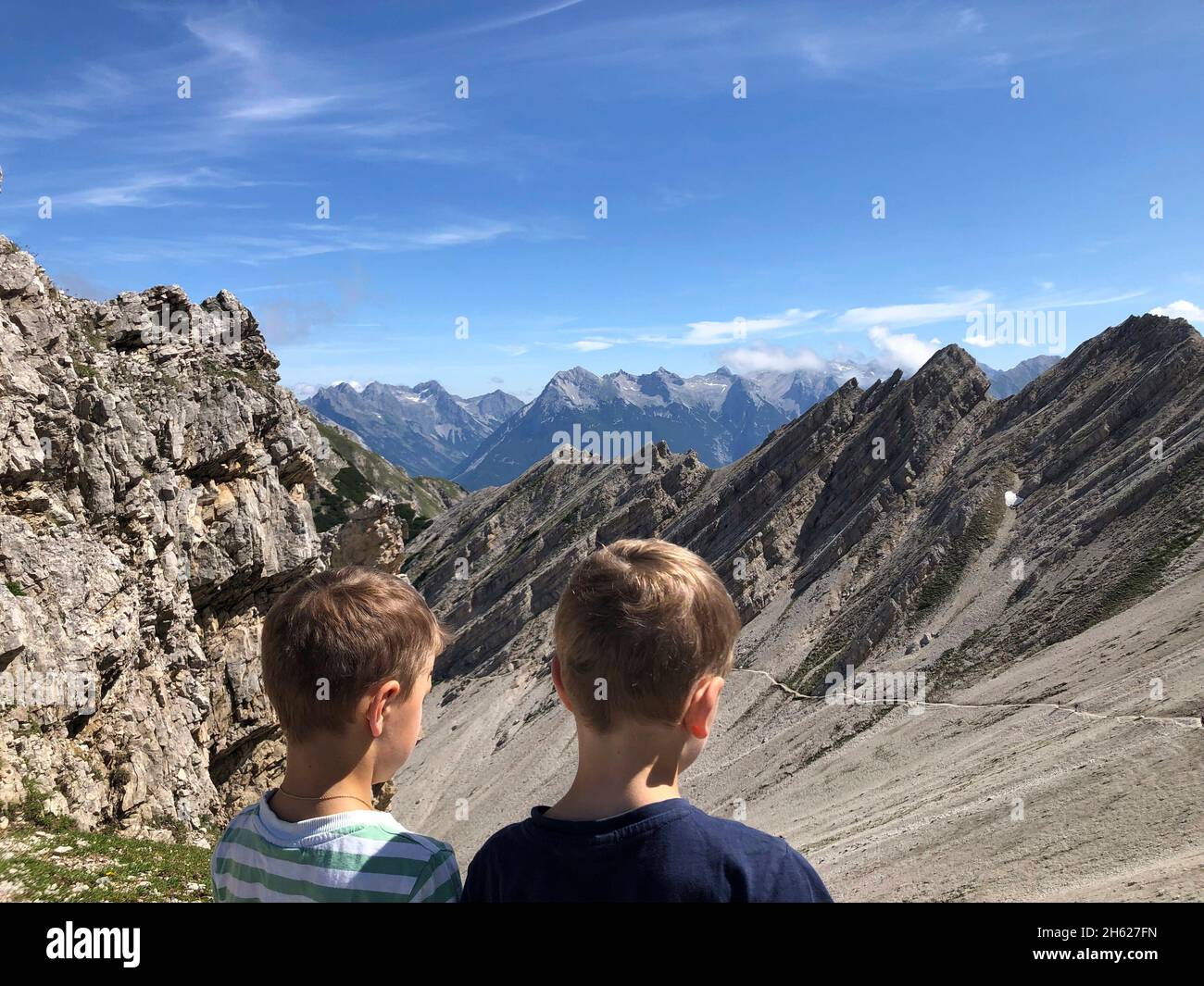 two boys look at the seefelder höhenweg,seefelder spitze,reither spitze ...