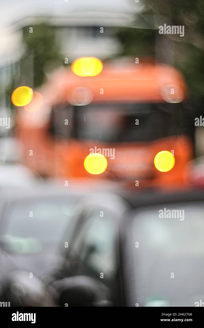 garbage collection trolley with hazard warning lights,abstract blur ...