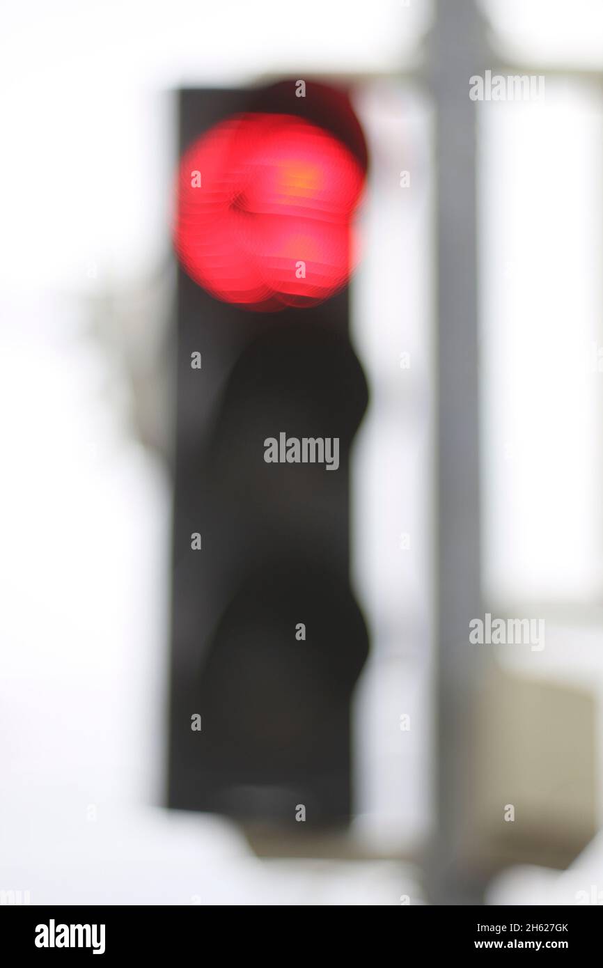 traffic lights with red light signals,abstract blur Stock Photo - Alamy