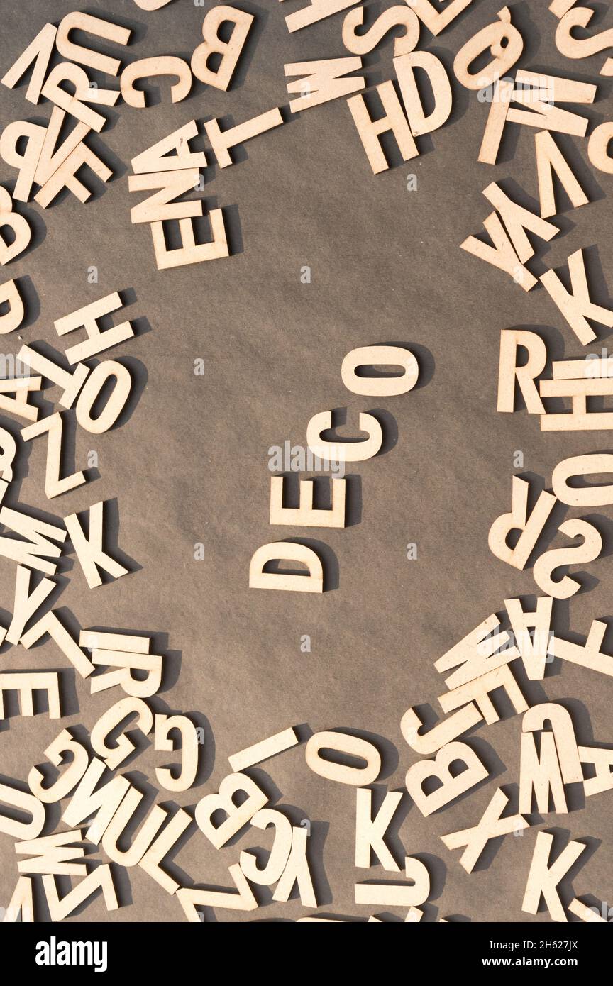 Deco Word In Wooden Cube Alphabet Letters Top View On A rustic paper ...