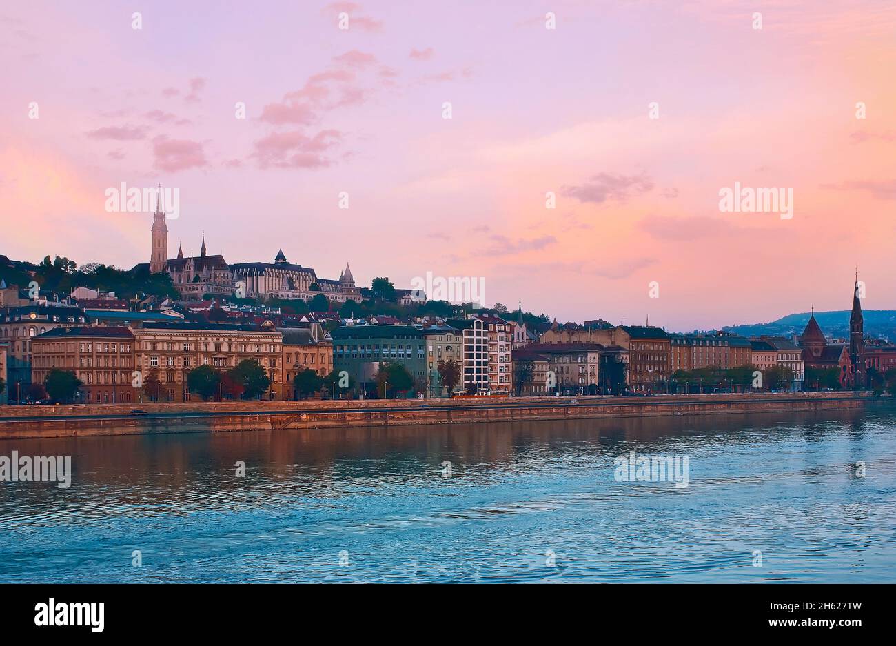 The Buda district at the golden hour with a view of historic housing ...