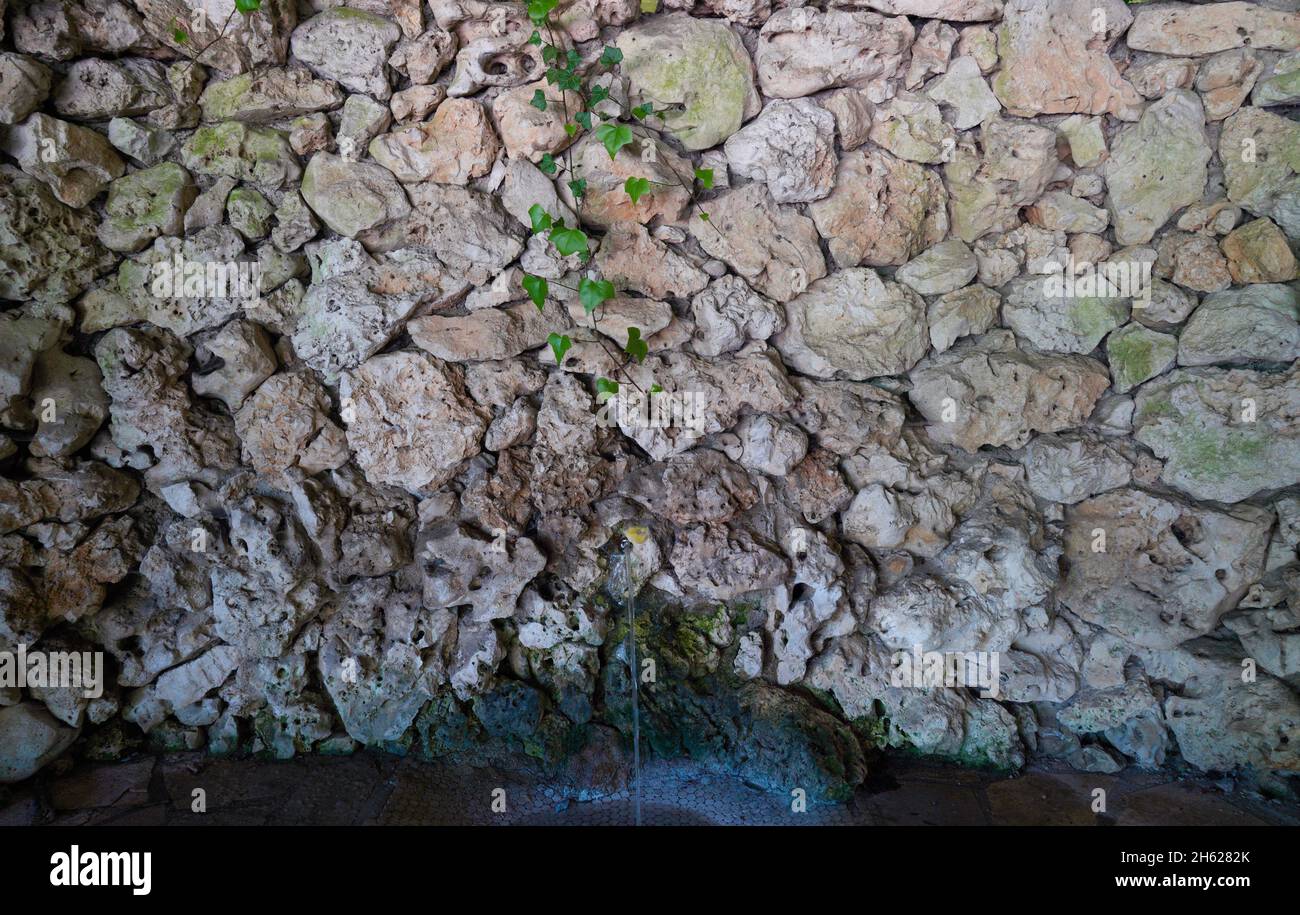 Structure of a stone made of natural mineral material as a background ...