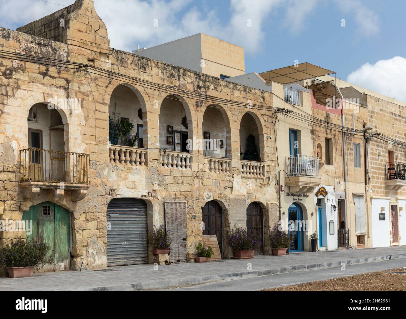 Close up of traditional old Maltese buildings in Marsaxlokk, Malta ...