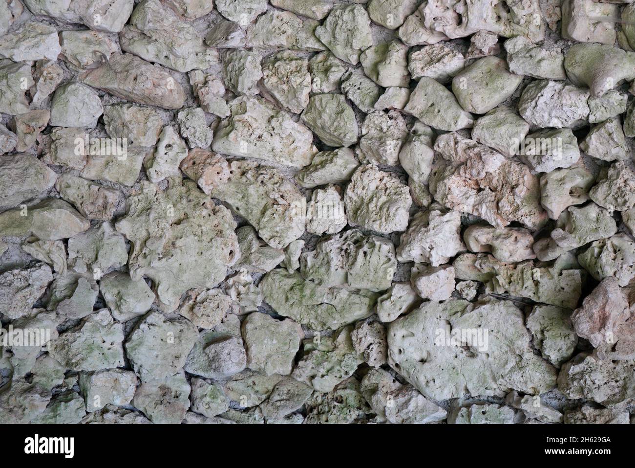 Structure of a stone made of natural mineral material as a background ...