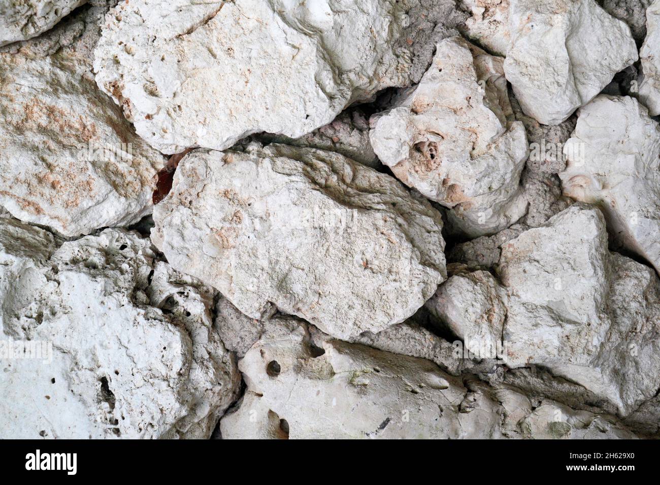 Structure of a stone made of natural mineral material as a background ...