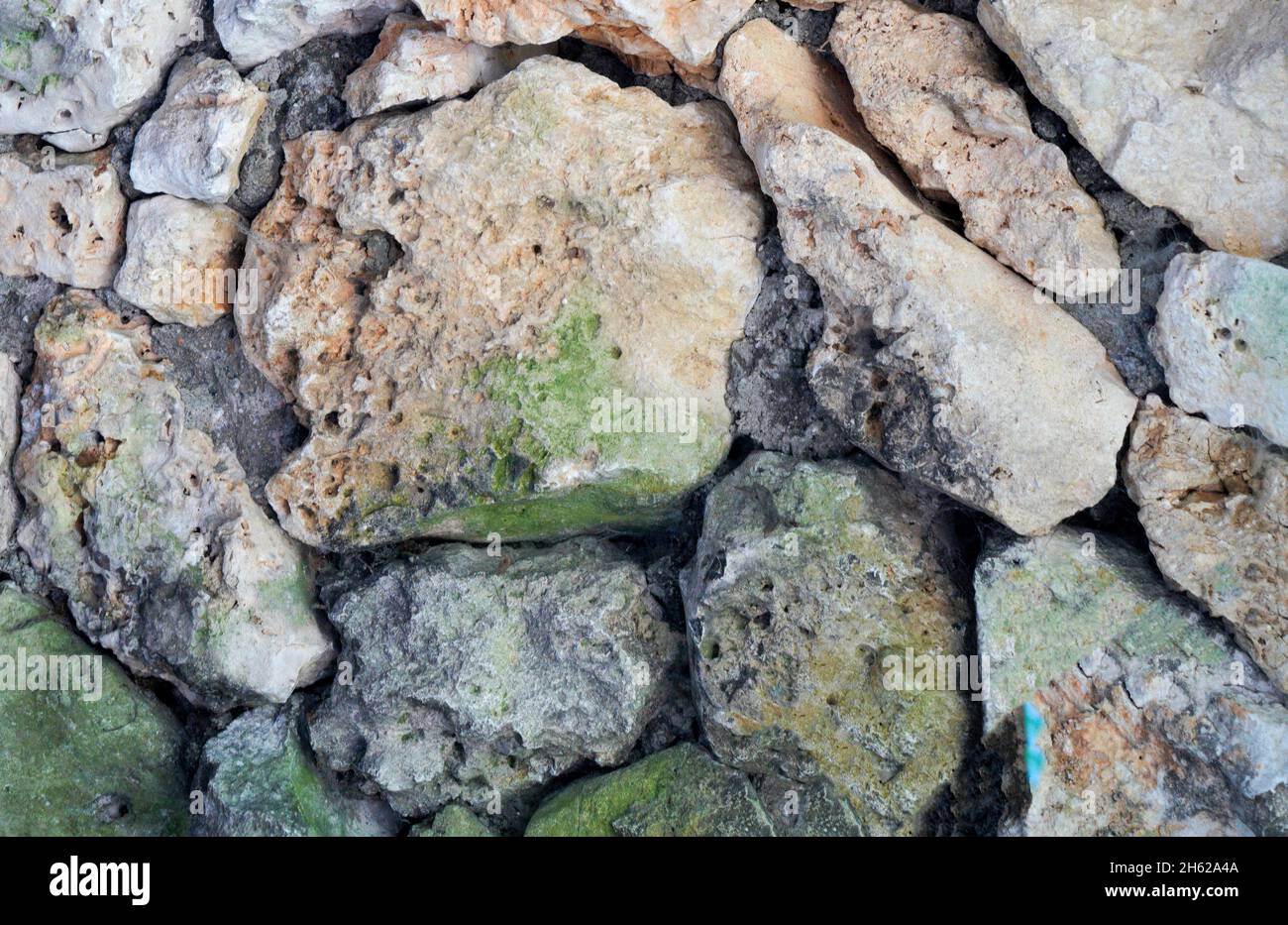 Structure of a stone made of natural mineral material as a background ...